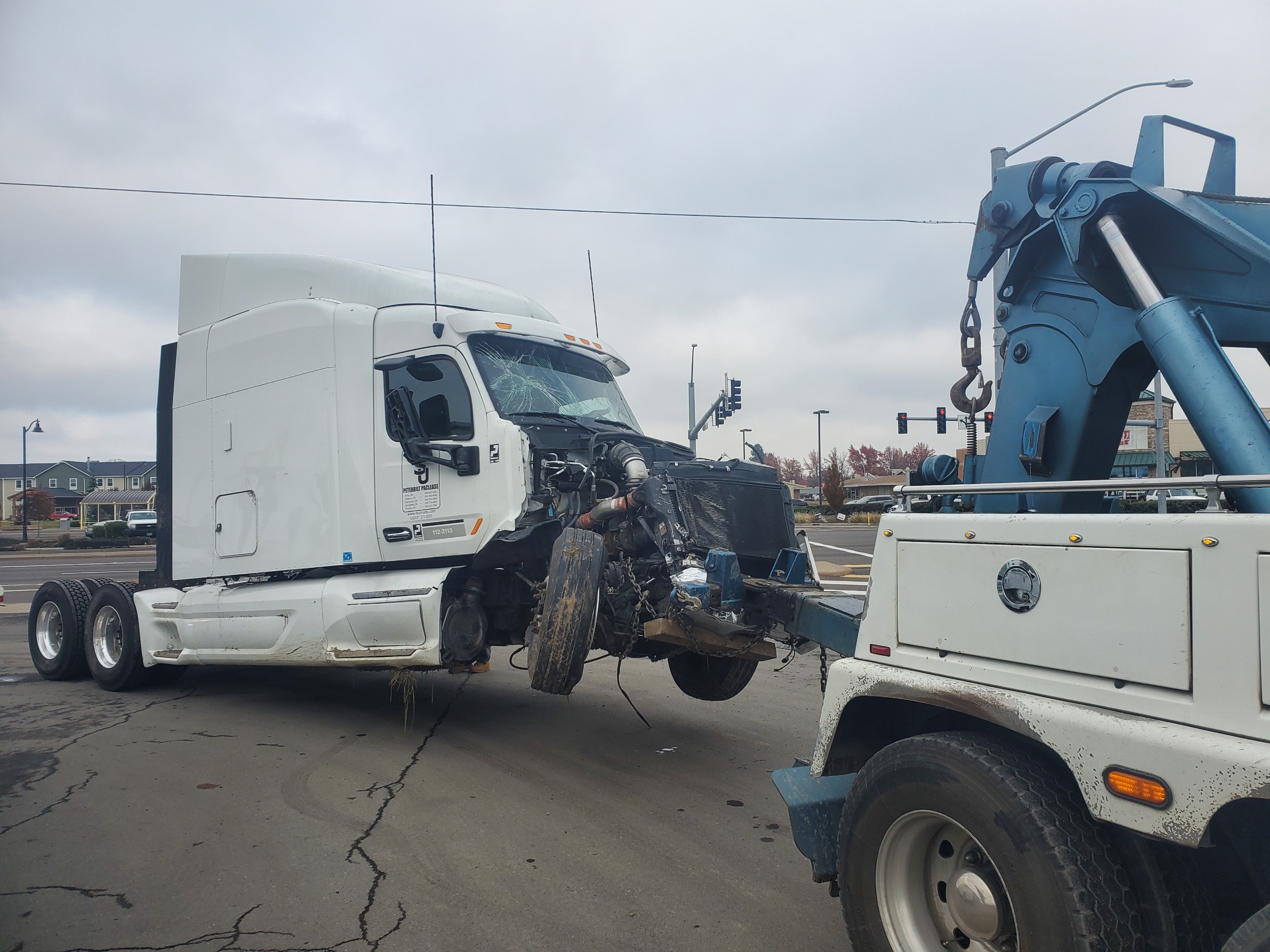 Semi-Truck Decking & Undecking Service | Baker & Baker Towing & Crane ...